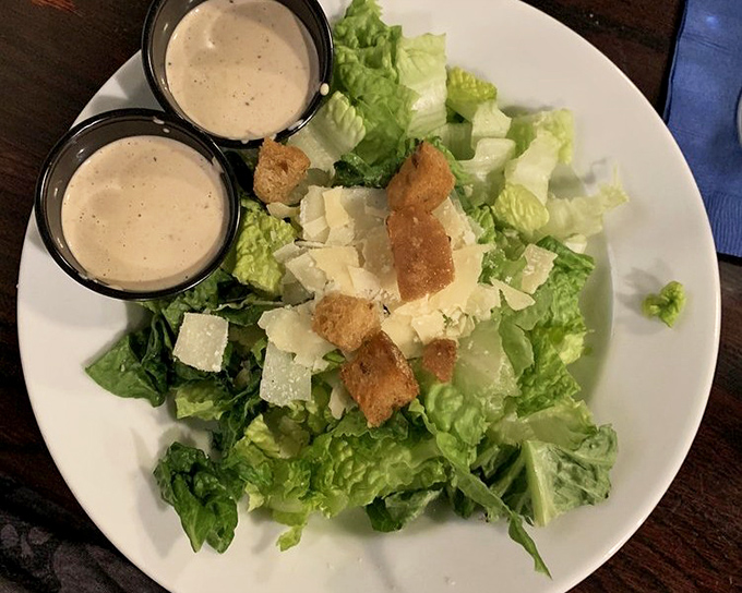 A proper Caesar salad &ndash; crisp, simple, and unapologetically classic. The kind that makes you wonder why anyone bothers with kale.