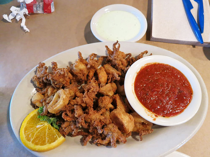 Fried calamari with marinara—crispy, tender rings of joy that make you wonder why we don't eat more cephalopods in everyday life.