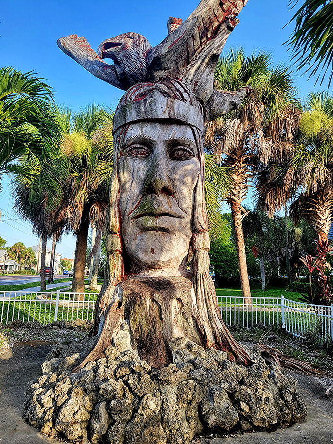 Carved history stands tall. This impressive wooden sculpture transforms what was once merely a tree into a conversation piece that will definitely startle first-time visitors.