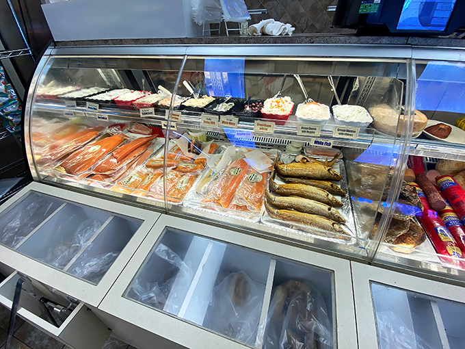 Behind glass, deli meats and salads await their moment of glory. This display case has launched thousands of memorable meals and satisfied cravings.