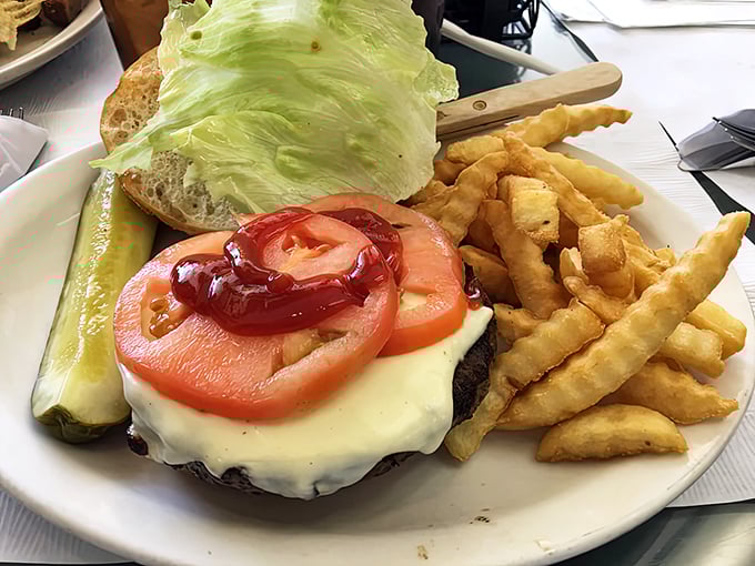 This isn't just a cheeseburger &ndash; it's lunch redemption for those who slept through breakfast, complete with crispy, golden fry companions.