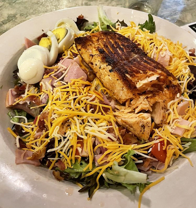 This isn't just a salad&mdash;it's a celebration. Grilled chicken perched atop a mountain of fresh ingredients like a delicious king of the hill.