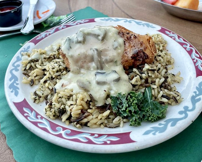 Chicken smothered in mushroom sauce atop wild rice &ndash; proof that "smothered" is a culinary term of endearment in Wisconsin supper clubs.