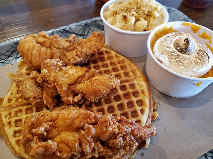 Chicken and waffles with sides of mac and cheese and something creamy&mdash;proof that breakfast and dinner boundaries were meant to be deliciously broken.