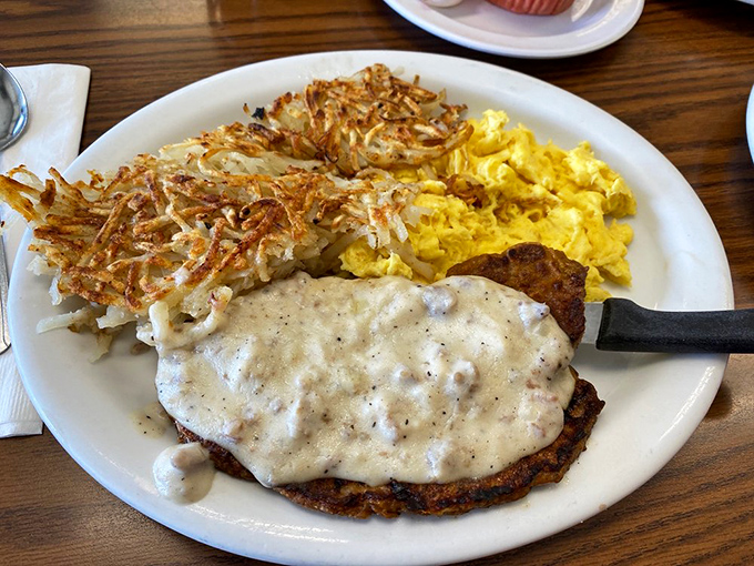 Country-fried steak under a blanket of gravy that could make a vegetarian question their life choices. This plate means business.