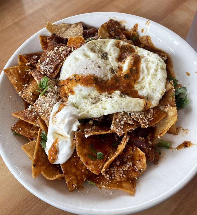 Chilaquiles that would make your Mexican grandmother nod in approval. That egg on top is the breakfast equivalent of a cherry on a sundae.