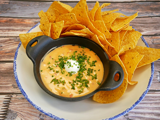 This queso doesn't just sit there looking pretty&mdash;it demands participation, with chips standing at attention ready for their delicious duty.
