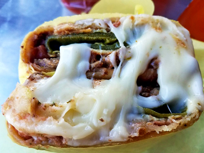 The chile relleno burrito in all its cross-sectional glory&mdash;like a geological core sample of deliciousness.