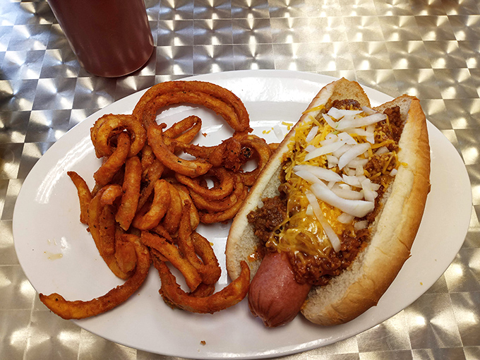 This chili cheese dog with curly fries isn't just lunch&mdash;it's proof that sometimes the simplest pleasures are the most satisfying.