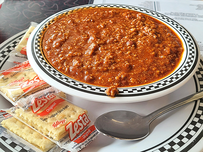 Chili that demands respect &ndash; rich, hearty, and thick enough to stand a spoon in, served with crackers for essential structural support.