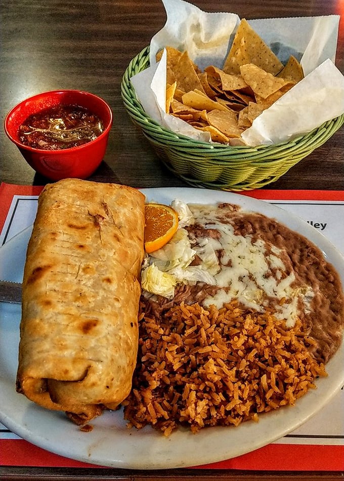 This isn't just a chimichanga&mdash;it's a golden-brown treasure chest filled with savory delights, accompanied by the rice and beans of your dreams.