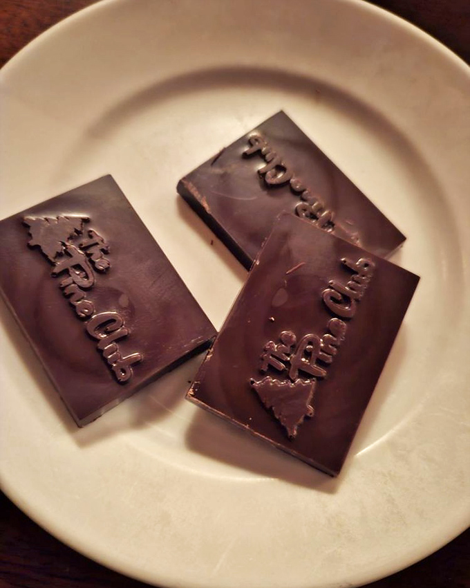 The Pine Club's signature chocolates arrive at meal's end like a sweet punctuation mark on an epic culinary sentence.