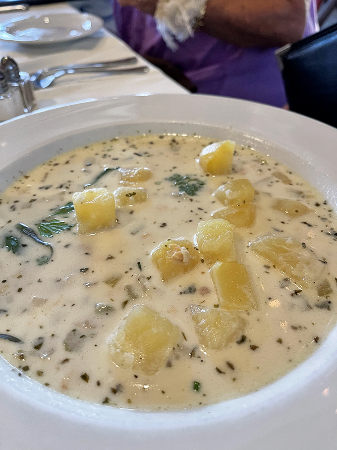 This isn't just clam chowder&mdash;it's a creamy ocean hug in a bowl, studded with tender potatoes and herbs that transport you straight to the coastline.
