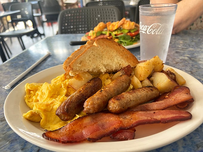 The breakfast platter that answers the eternal question: "Why choose between eggs, sausage, bacon, and potatoes when you can have it all?"