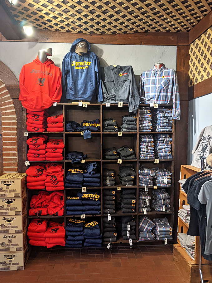 The merchandise wall for those who want to wear their beverage loyalty like a badge of honor. Root beer fashion is the new black.