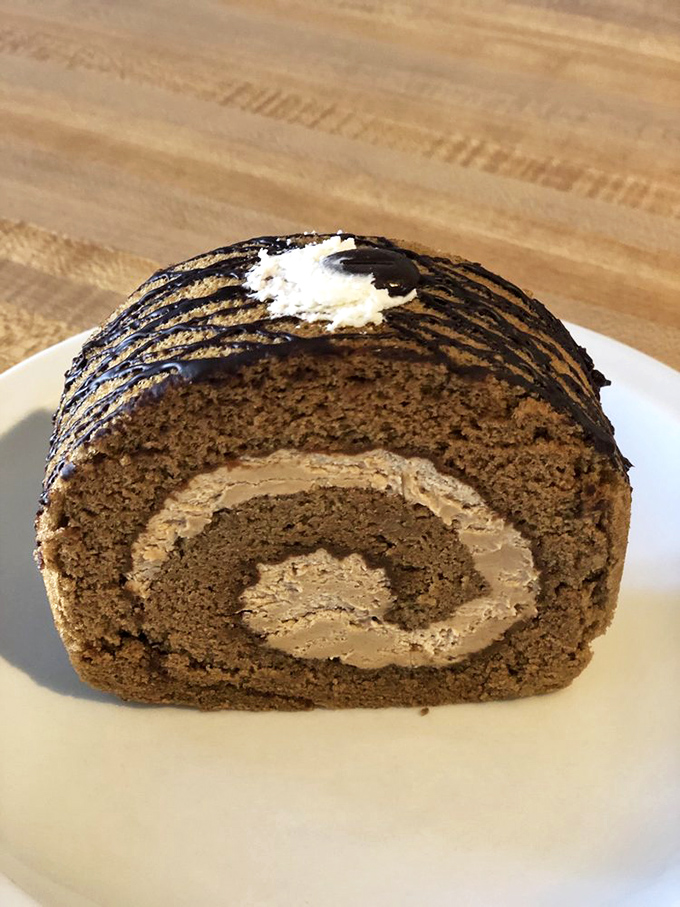 This coffee roll isn't playing around—it's bringing serious chocolate intensity wrapped in a spiral of cake that hypnotizes you into taking another bite