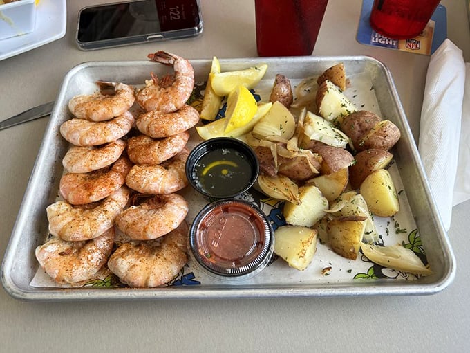 Colossal steamed shrimp arranged like a pink army marching toward victory. These plump soldiers come armed with lemon wedges and two dipping sauces for strategic flavor attacks.