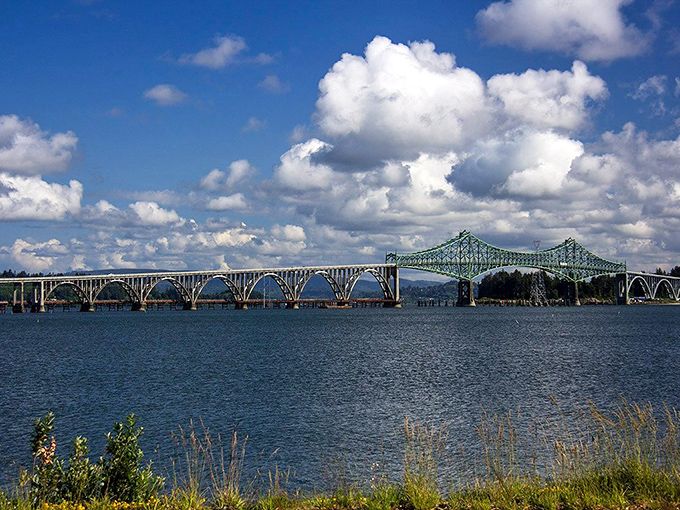 The McCullough Memorial Bridge arches gracefully across Coos Bay, connecting communities with engineering elegance. Infrastructure that deserves a second glance.