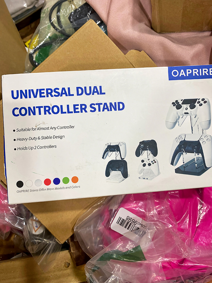 Game night upgrade alert! This dual controller stand brings order to chaotic entertainment centers while giving gaming accessories the throne they deserve.