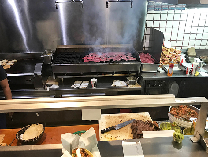 Meat sizzling on the flat-top creates an aromatic fog of deliciousness that's better than any cologne ever bottled.