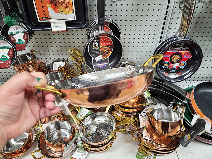Copper-bottomed cookware gleaming like treasure. Pirates once sought gold; modern adults hunt for affordable kitchen tools.