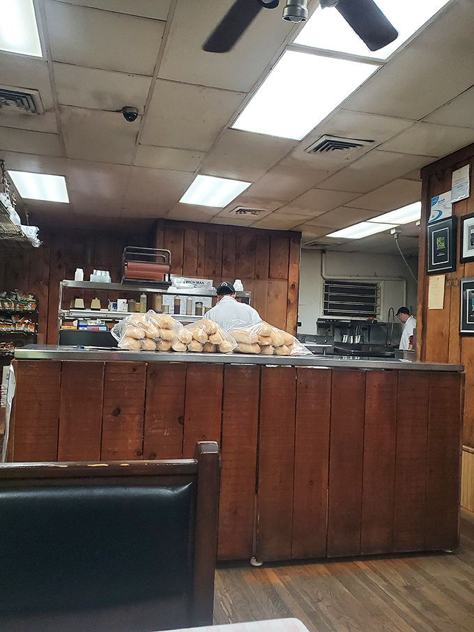 Fresh rolls waiting for their destiny&mdash;the bread lineup at Sandwich Man is the starting point of all good decisions.