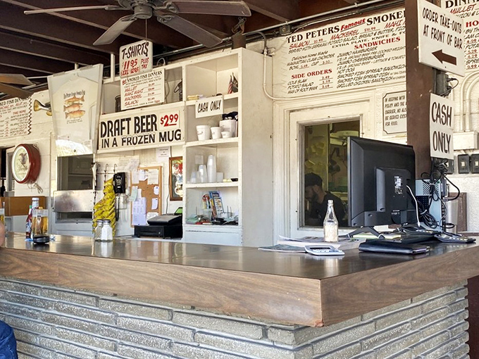 The counter where magic happens. Hand-written menus, frozen beer mugs, and cash-only signs&mdash;all indicators you've found authentic Florida gold.