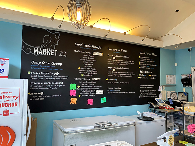 The ordering counter showcases fresh bread loaves, hinting at the homemade goodness awaiting your taste buds.
