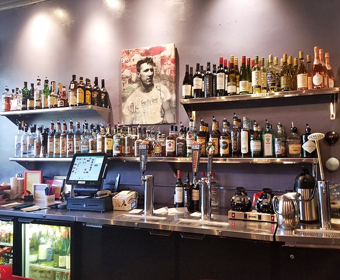 The kind of bar where strangers become friends over shared food recommendations. Those bottles aren't just decoration&mdash;they're possibilities.