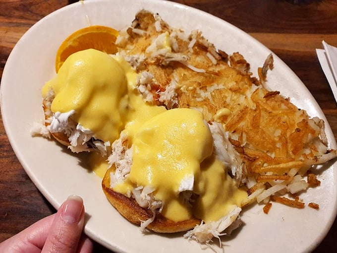 Eggs Benedict gets a coastal makeover with sweet crab meat and sunshine-yellow hollandaise that demands to be photographed.