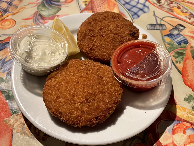 Crab cakes that achieve the perfect ratio of crab to binding&mdash;golden-brown discs of ocean flavor that make tartar sauce an equal partner, not a cover-up.