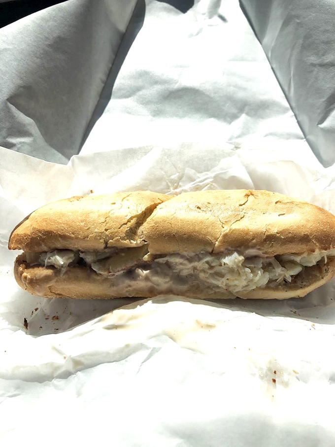 The crab sandwich that launched a thousand road trips. Worth every mile of coastal highway and minute in line.