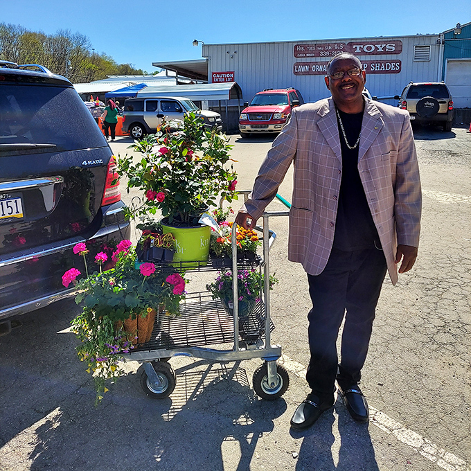 Shopping becomes a social experience when you're wheeling treasures to your car. This customer's cart suggests a garden transformation is imminent.