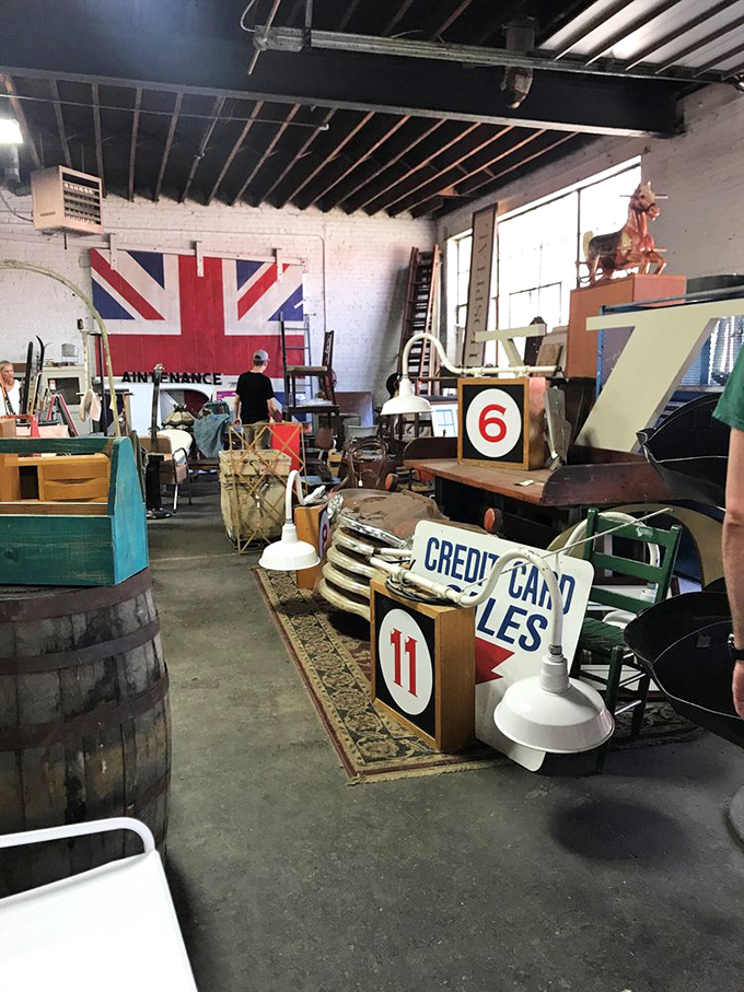 Treasure hunting requires proper navigation skills. The Union Jack and vintage signage create the perfect backdrop for serious antiquing expeditions.