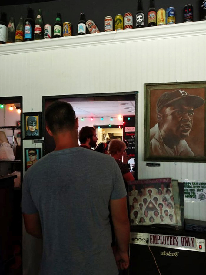 The collection of bottles lining the wall isn't just decoration&mdash;it's a timeline of good times had by those who know the BYOB secret. 
