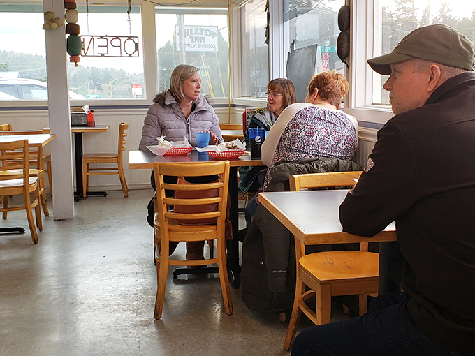 The dining room hums with the satisfied murmurs of locals who know they've made the right lunch decision. Again.