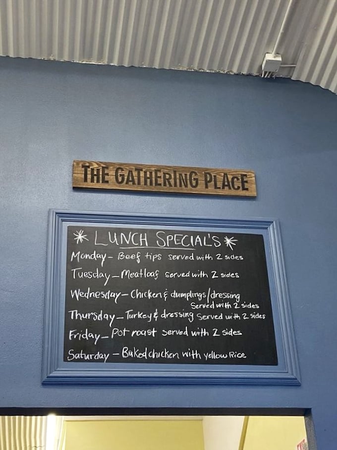 The Gathering Place sign hangs above a chalkboard showcasing daily specials &ndash; Thursday's turkey and dressing already has me planning my week.