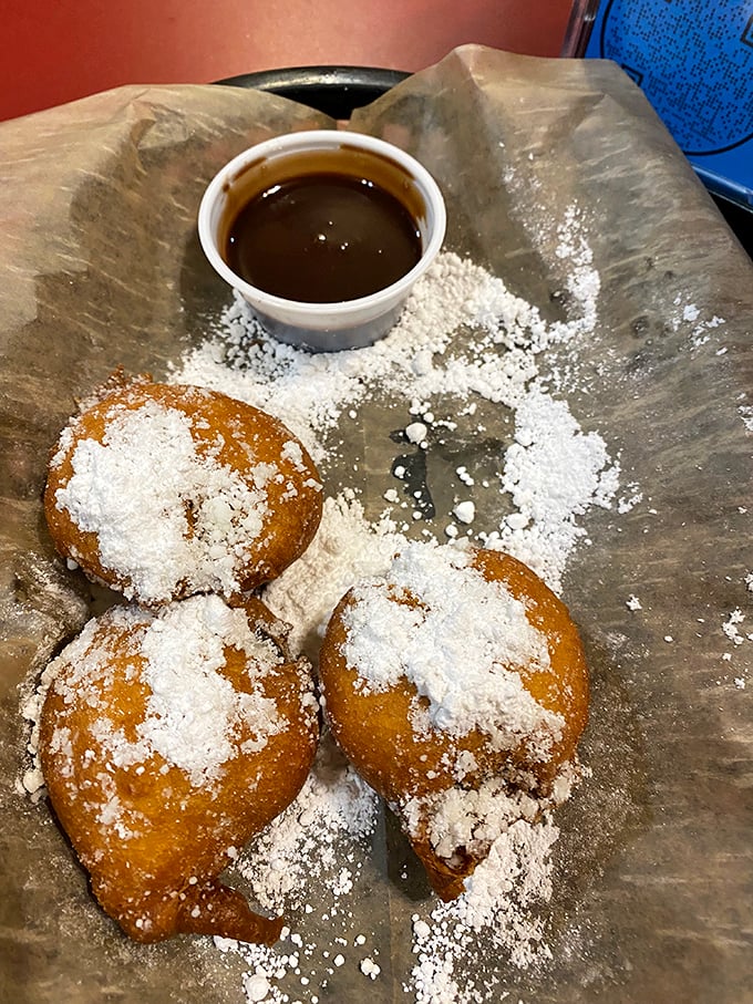 Deep-fried Oreos dusted with powdered sugar, because sometimes dessert needs to break all the rules.