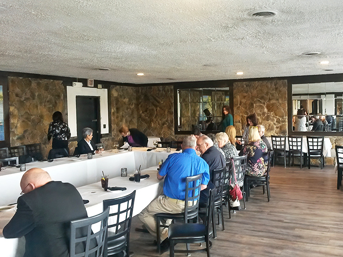 A dining room filled with people who know the secret: great Italian food is best enjoyed in good company, with plenty of time to savor both.