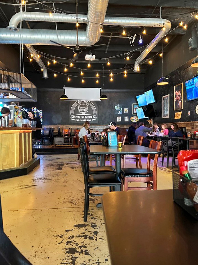 The natural habitat of burger enthusiasts in their element&mdash;plotting strategies to tackle towering creations without wearing half of them.