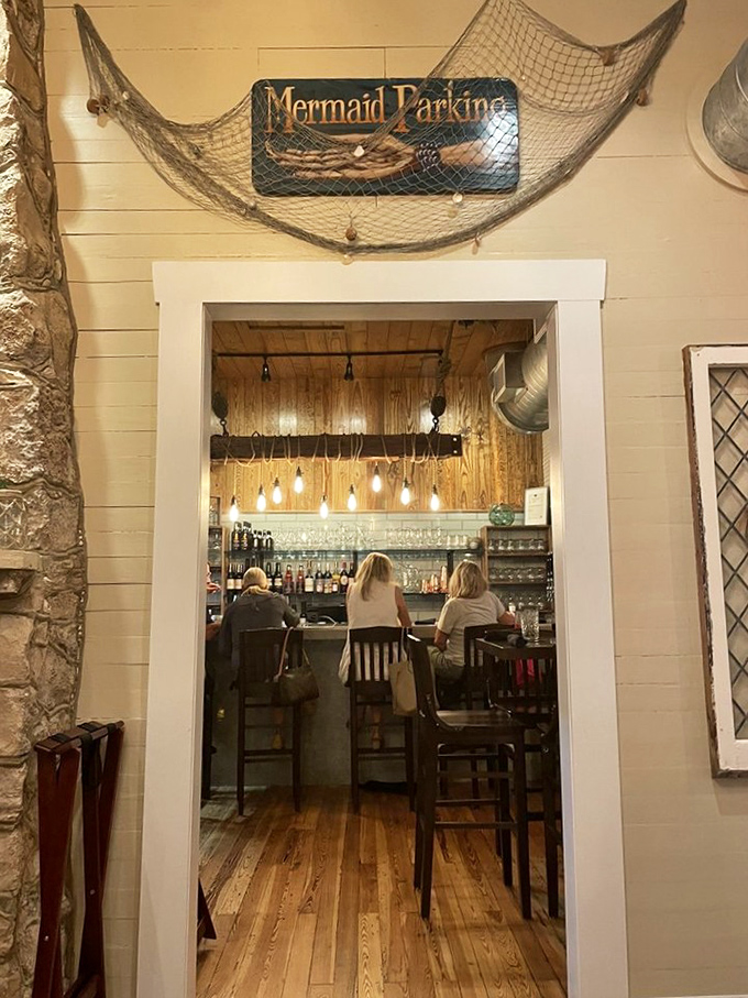 Happy diners sharing stories and steaks, proving good food creates the best kind of dinner theater.