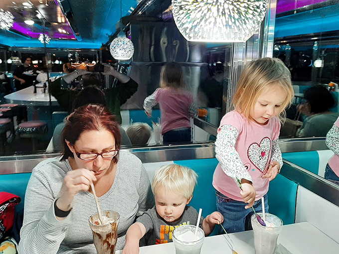 Family milkshake moments that create memories sweeter than any dessert. Three straws, one shake, infinite happiness.