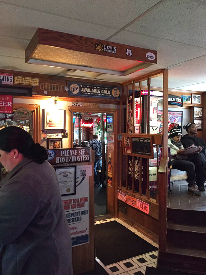 The entrance speaks volumes: "Please See Host/Hostess" is code for "Prepare yourself for what lies beyond these doors."