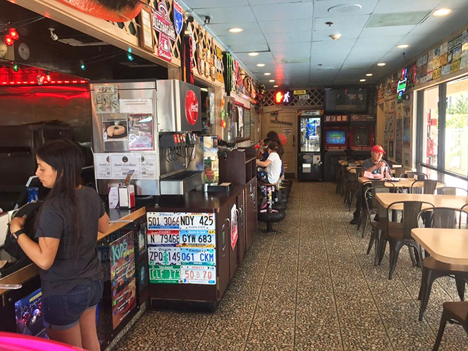 Happy faces around shared pizza prove that some traditions never lose their power to unite.