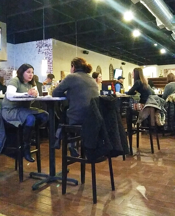 The true measure of a great local spot: tables filled with people too busy enjoying their food to check their phones.
