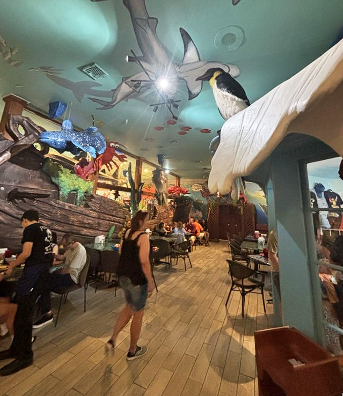 Where seafood pilgrims gather to worship at the altar of abundance. The ceiling creatures bear silent witness to countless "mmm" moments.