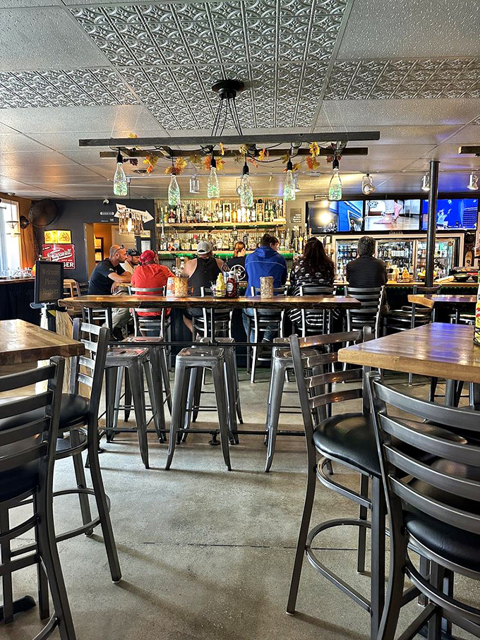 The bar area buzzes with the energy of a place where everybody might not know your name yet, but they're certainly willing to learn it.