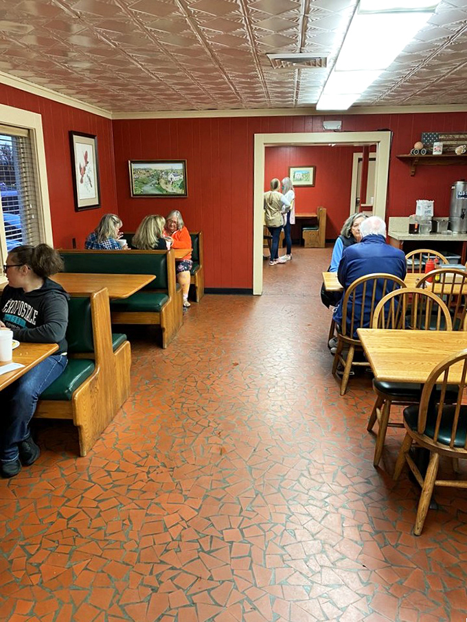 The dining room where strangers become neighbors over shared appreciation for smoke and time. These booths have heard decades of "mmms" and "wows."