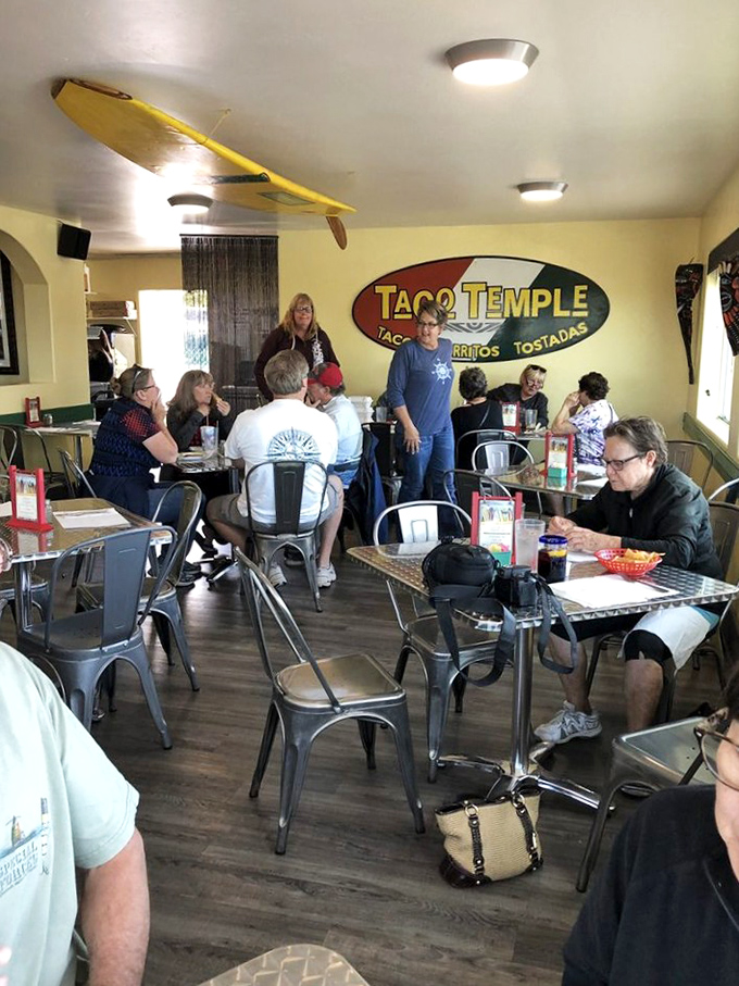 The dining room buzzes with the energy of happy eaters. Notice how nobody's looking at their phones&mdash;the food commands full attention.