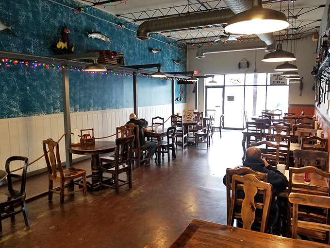 The dining room during a quieter moment&mdash;where wooden tables await the next round of seafood enthusiasts seeking their fish and chips fix.